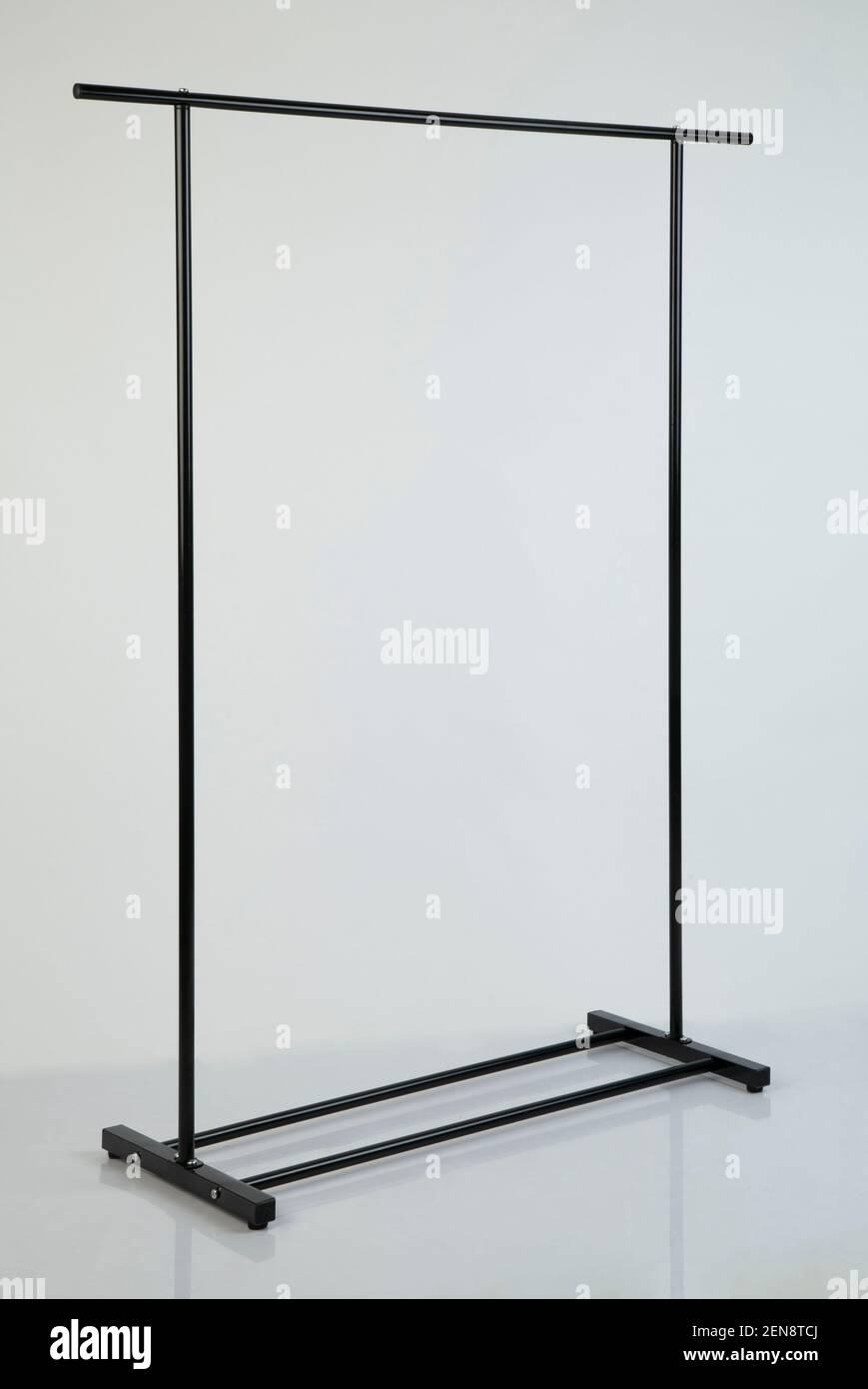 Empty cloth rack isolated on white background Stock Photo - Alamy