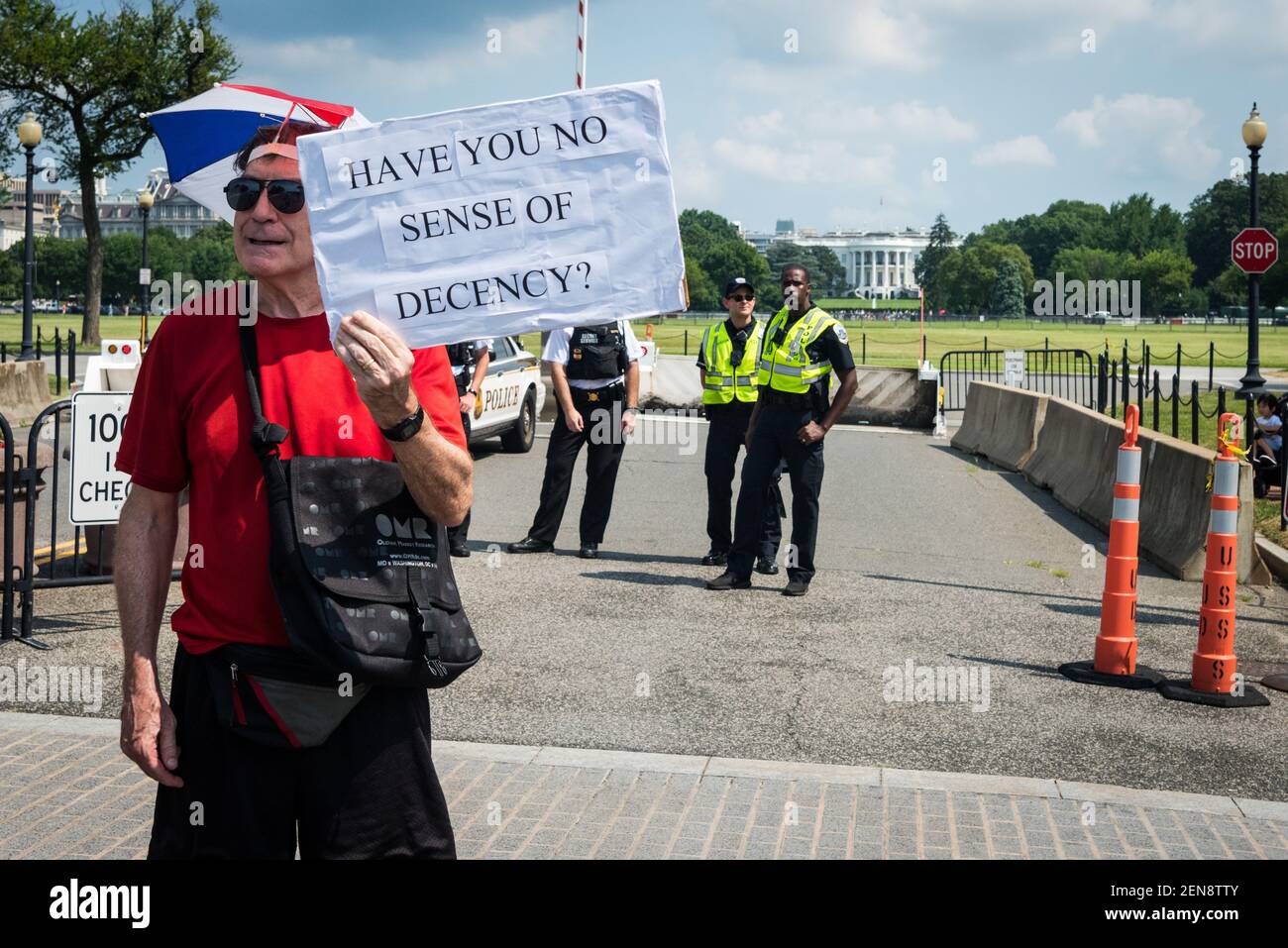 Activist reminding everyone of the McCarthy Hearings. -Thousands gather ...