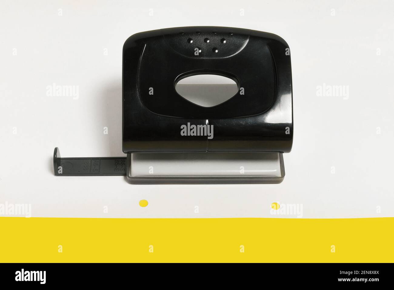 Paper clip hole punch hi-res stock photography and images - Alamy