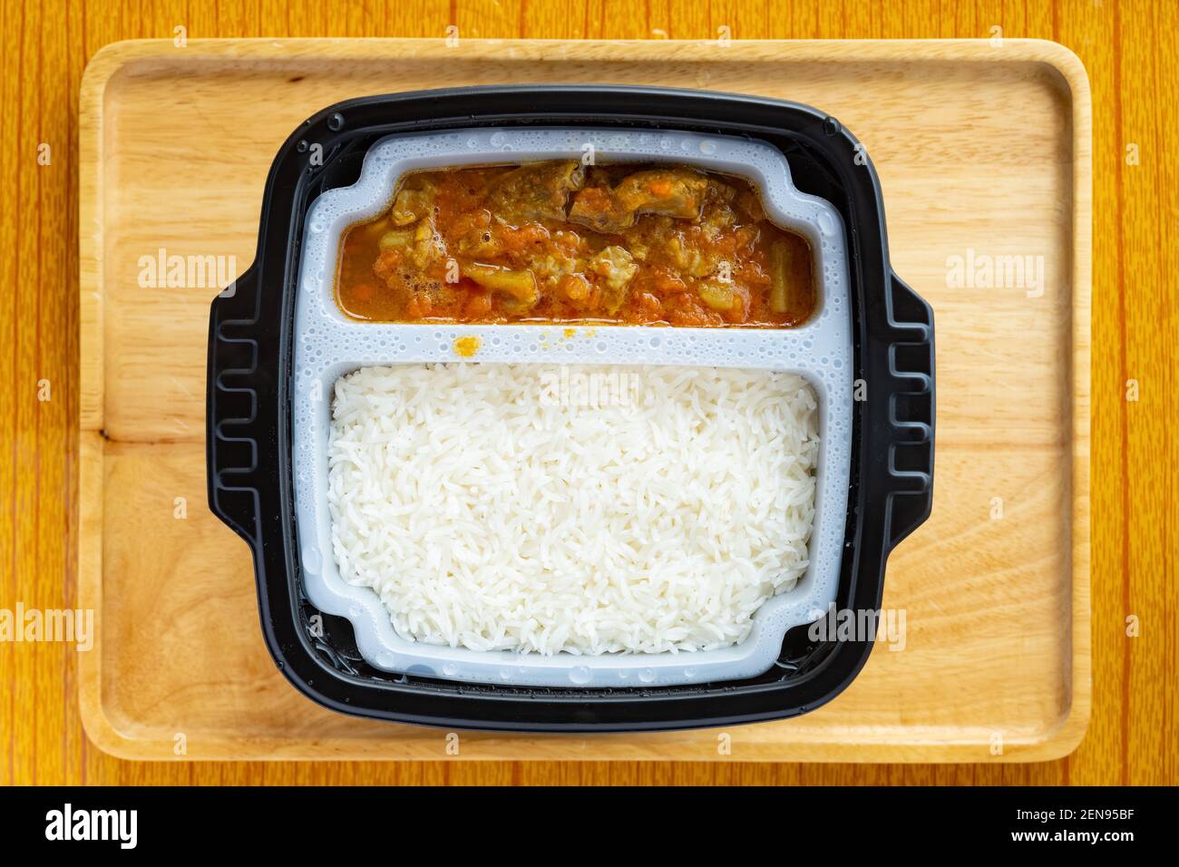 fresh self cooking fast food of rice with curry beef Stock Photo - Alamy
