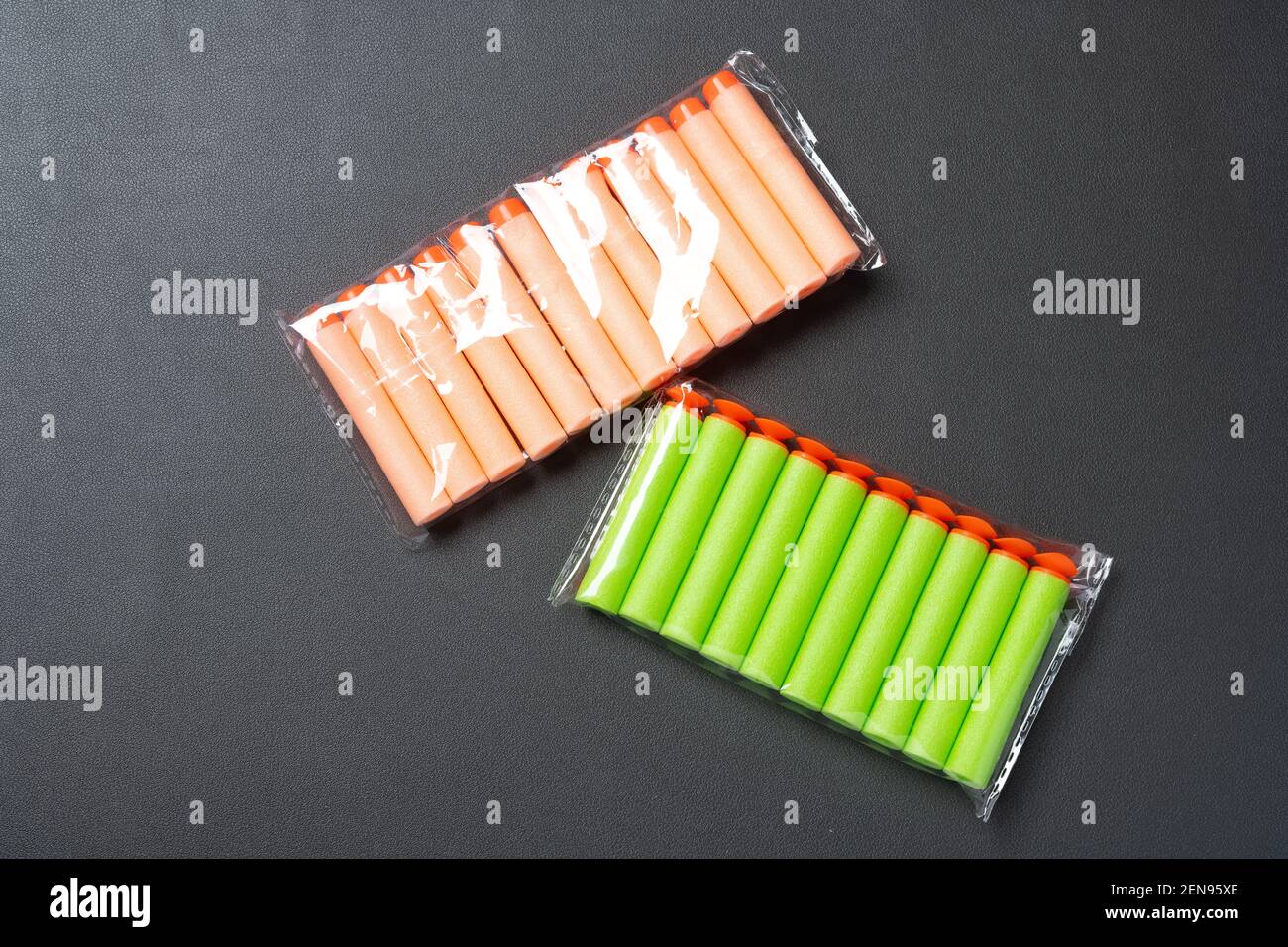soft toy bullets for children on dark background Stock Photo - Alamy