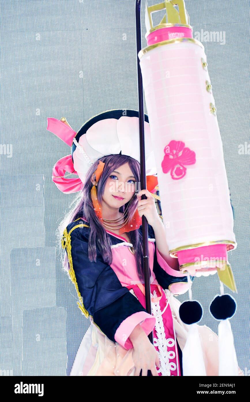 Japanese cosplayer and voice actress and singer Enako dressed in ...