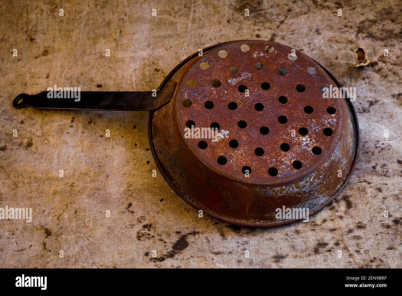 Old rusted drilled pan, France Stock Photo - Alamy
