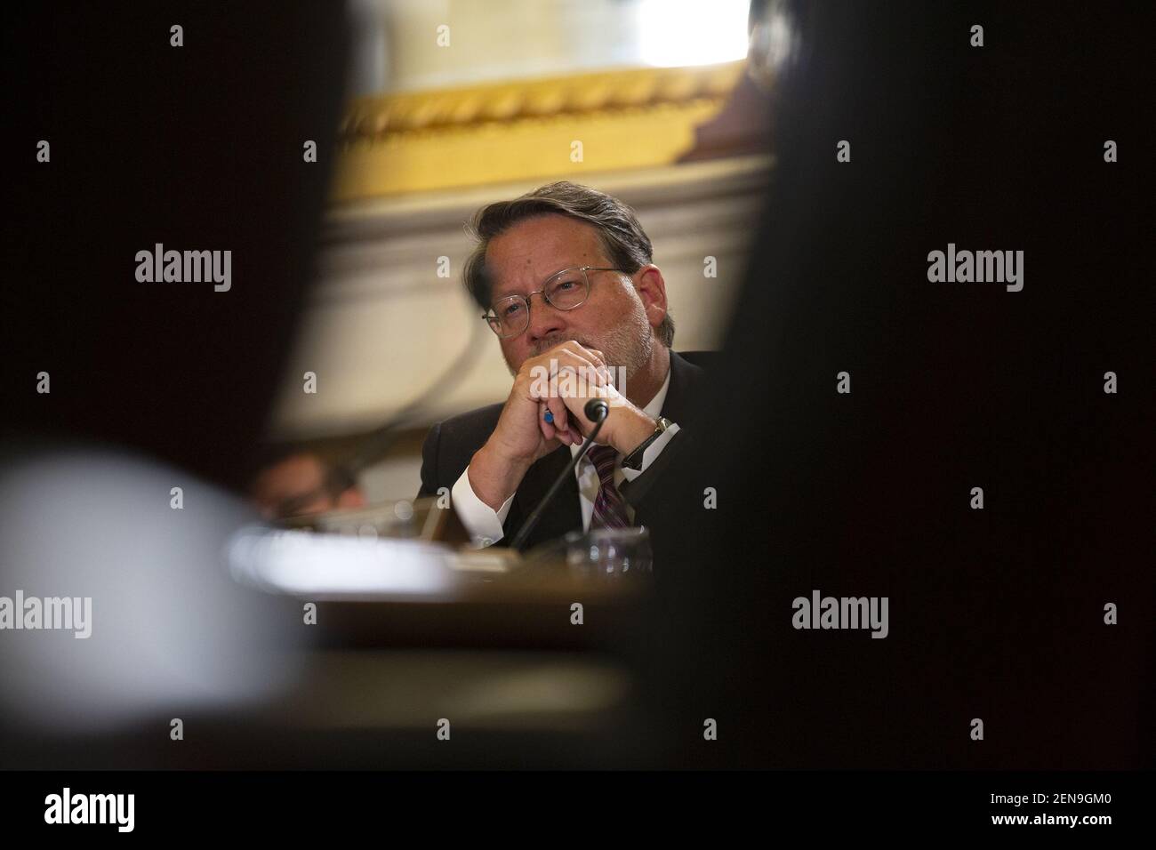 United States Senator Gary Peters (Democrat of Michigan) listens to ...