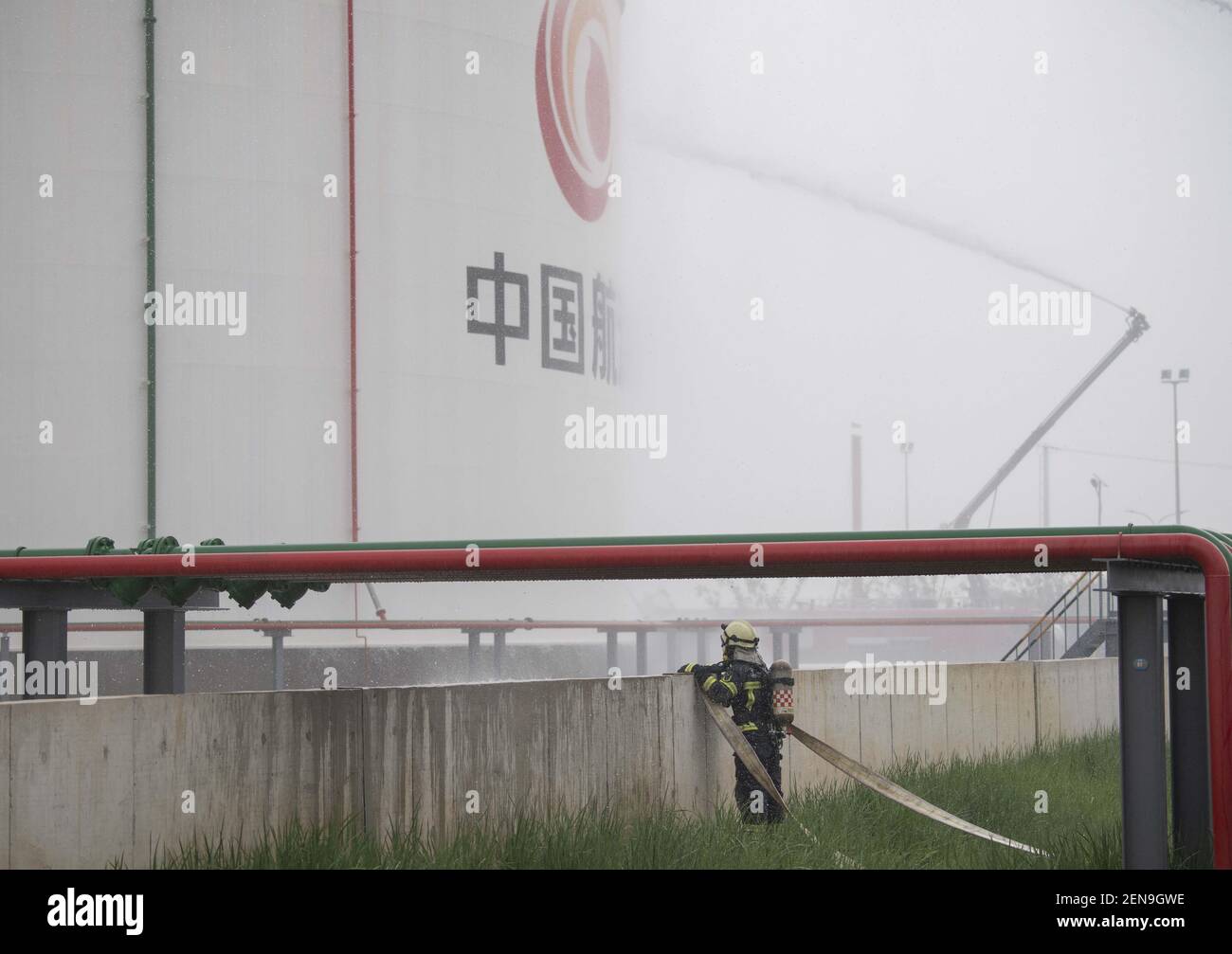 Chinese firefighters take part in the first fire drill at the Beijing ...