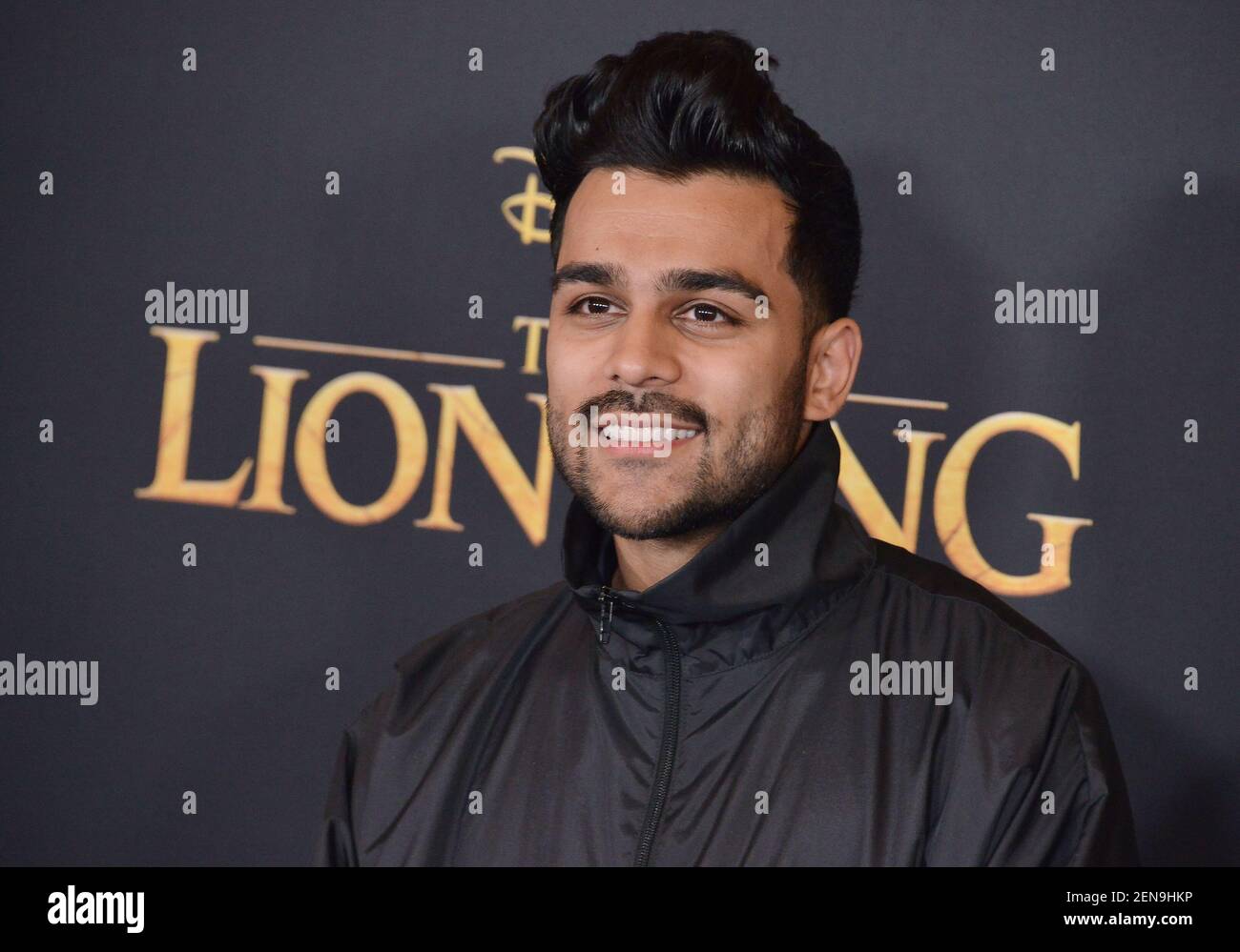 Adam Waheed arrives at the Disney's THE LION KING World Premiere held ...