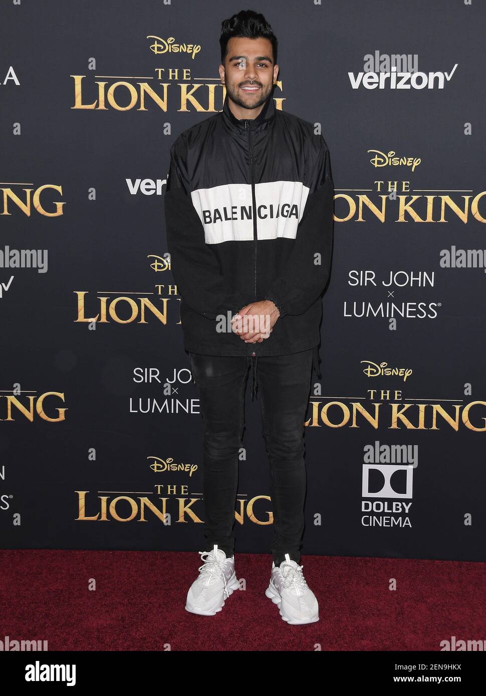 Adam Waheed arrives at the Disney's THE LION KING World Premiere held ...