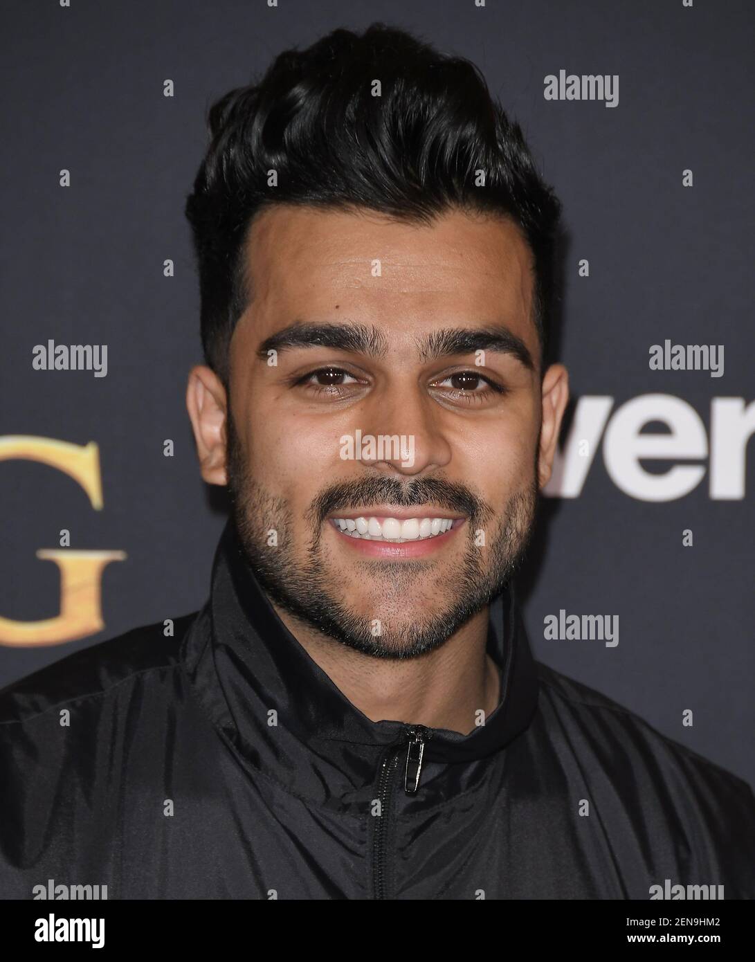 Adam Waheed arrives at the Disney's THE LION KING World Premiere held ...