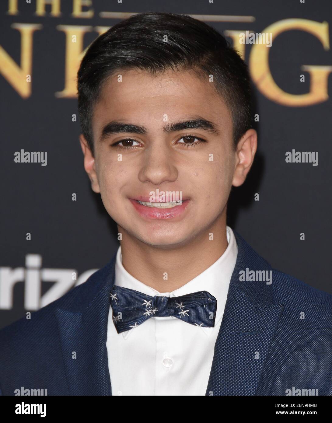 Neel Sethi arrives at the Disney's THE LION KING World Premiere held at ...