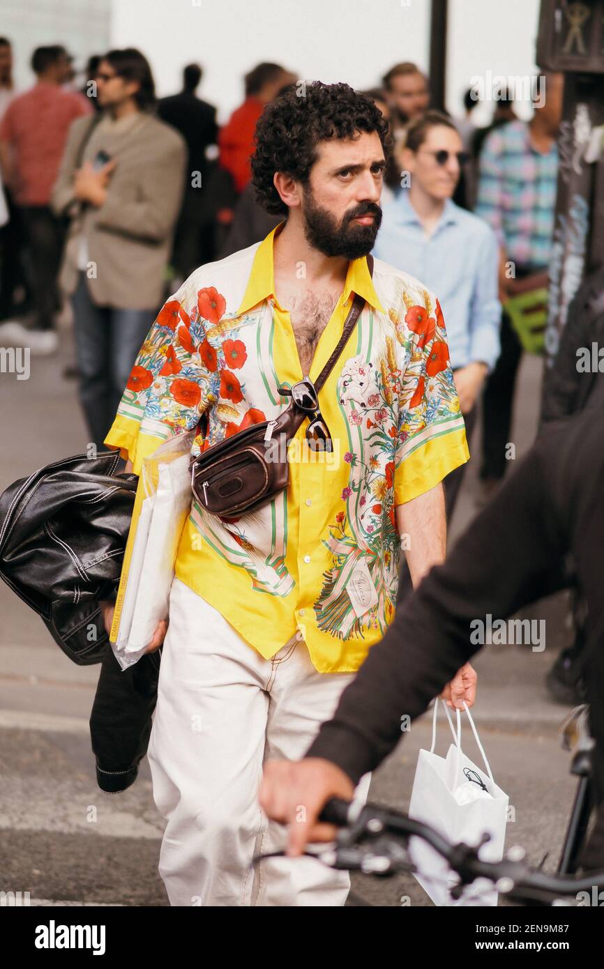 Trendy women and men pose for street snap during the Paris Fashion Week ...