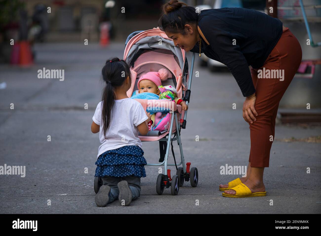 CHIANGMAI,THAILAND-Feb 11, 2021 : Happy small child looking after their ...
