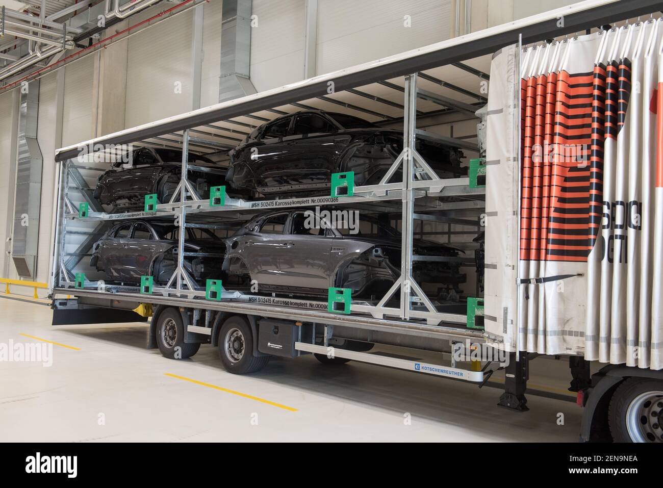 Painted Jaguar E-Space X540 bodies are prepared for transportation back ...