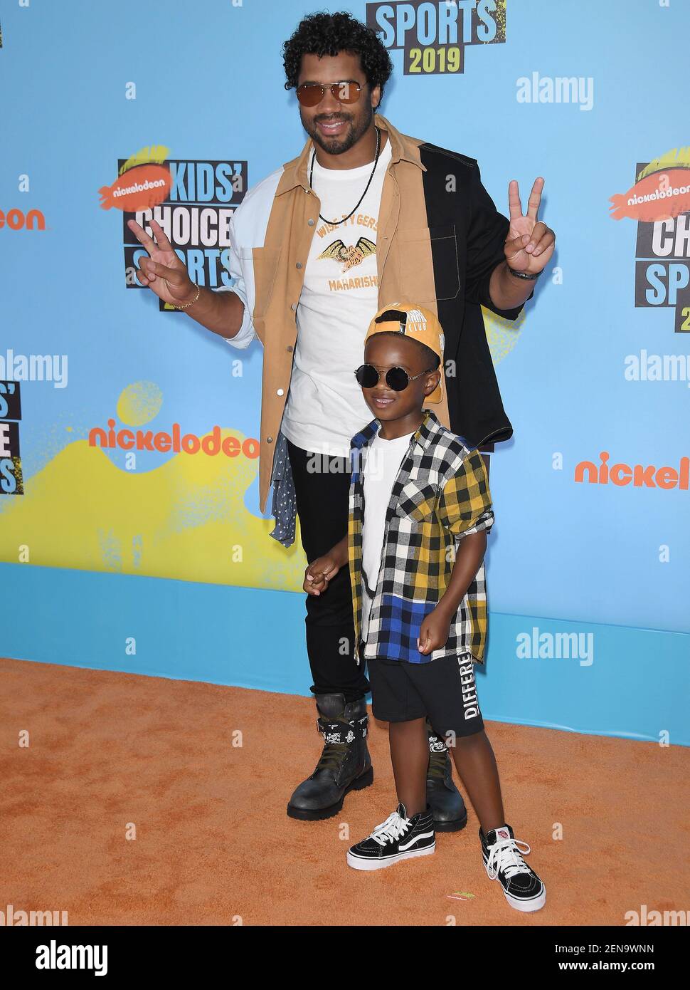 Russell Wilson and Son Future Zahir Wilburn arrives at the Nickelodeon ...