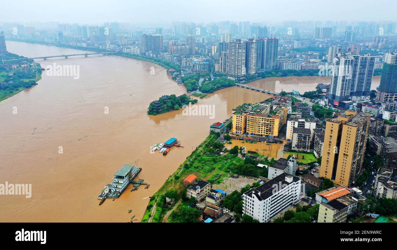 Aerial view of buidings overwhelmed by flood caused by heavy rain in ...