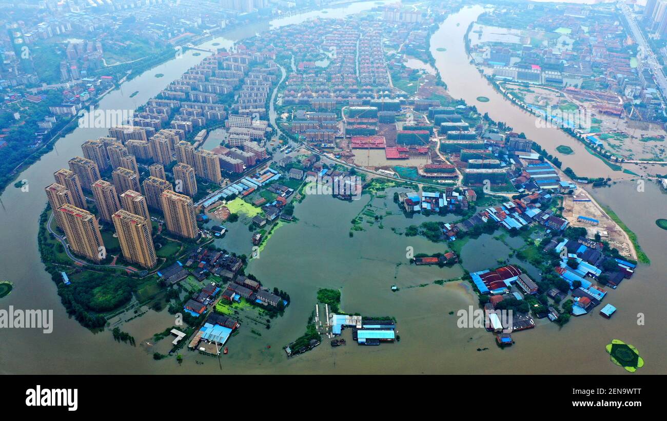 Aerial view of buidings overwhelmed by flood caused by heavy rain in ...