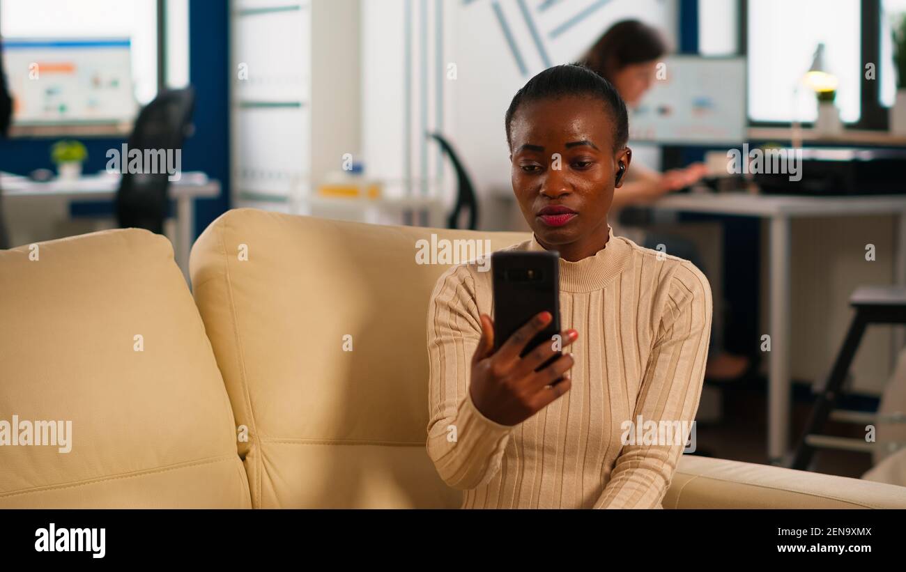 African manager woman discussing with remote colleagues on video call ...