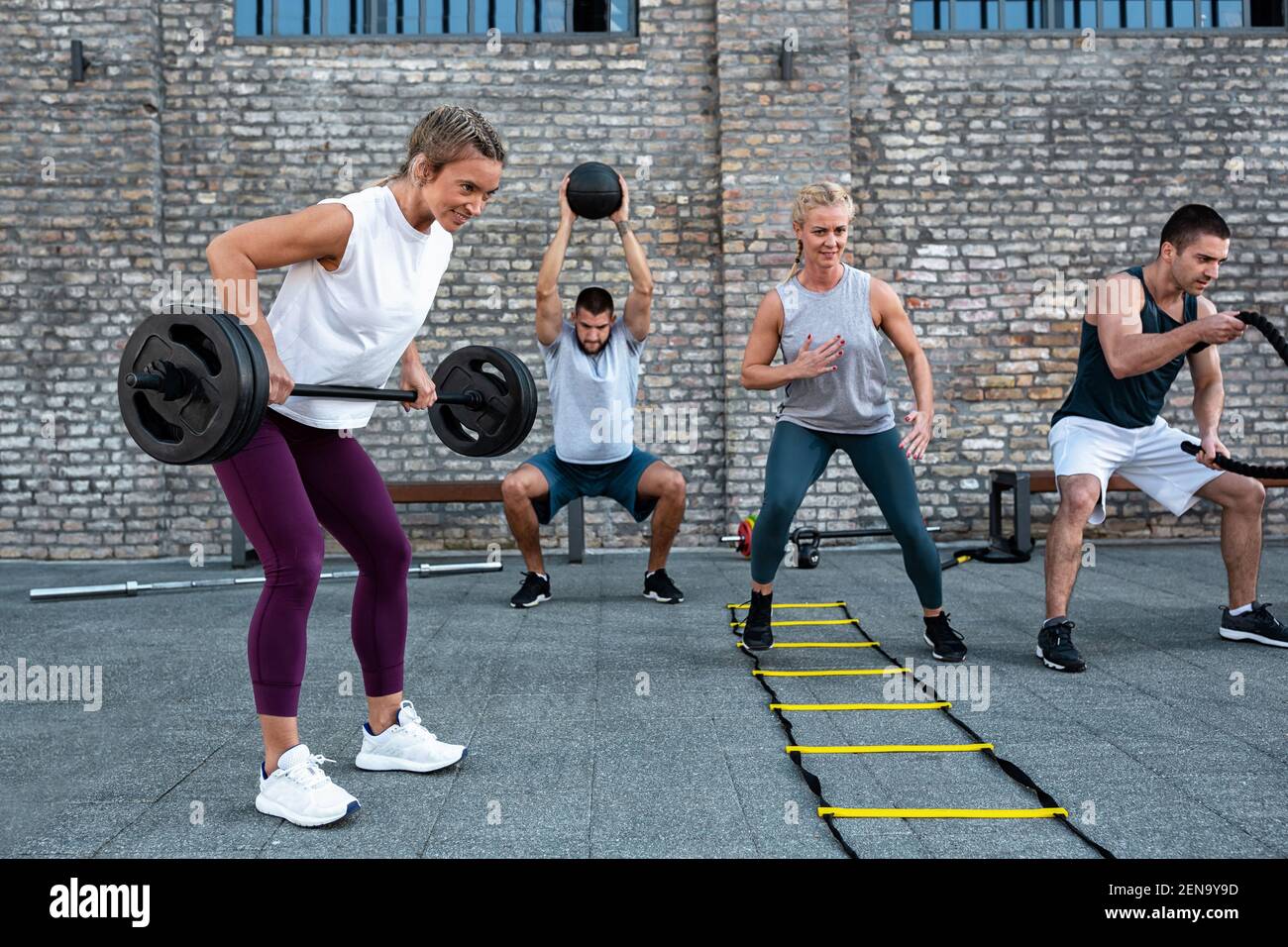 People working out various fitness exercises, outdoors workout concept ...