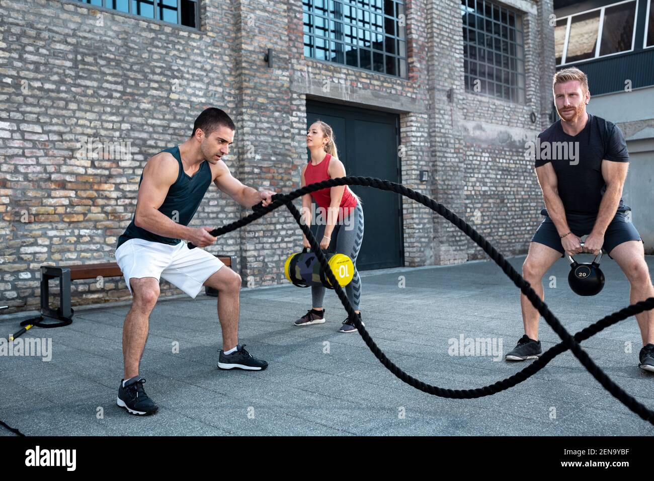 Group of athletes dedicated to their body shape training together Stock ...