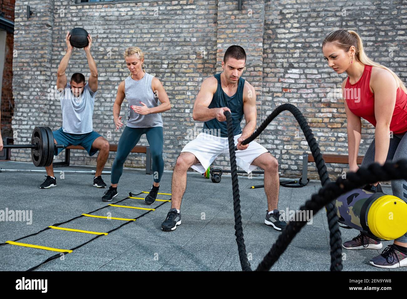 Group of athletes dedicated to their body shape training together Stock ...