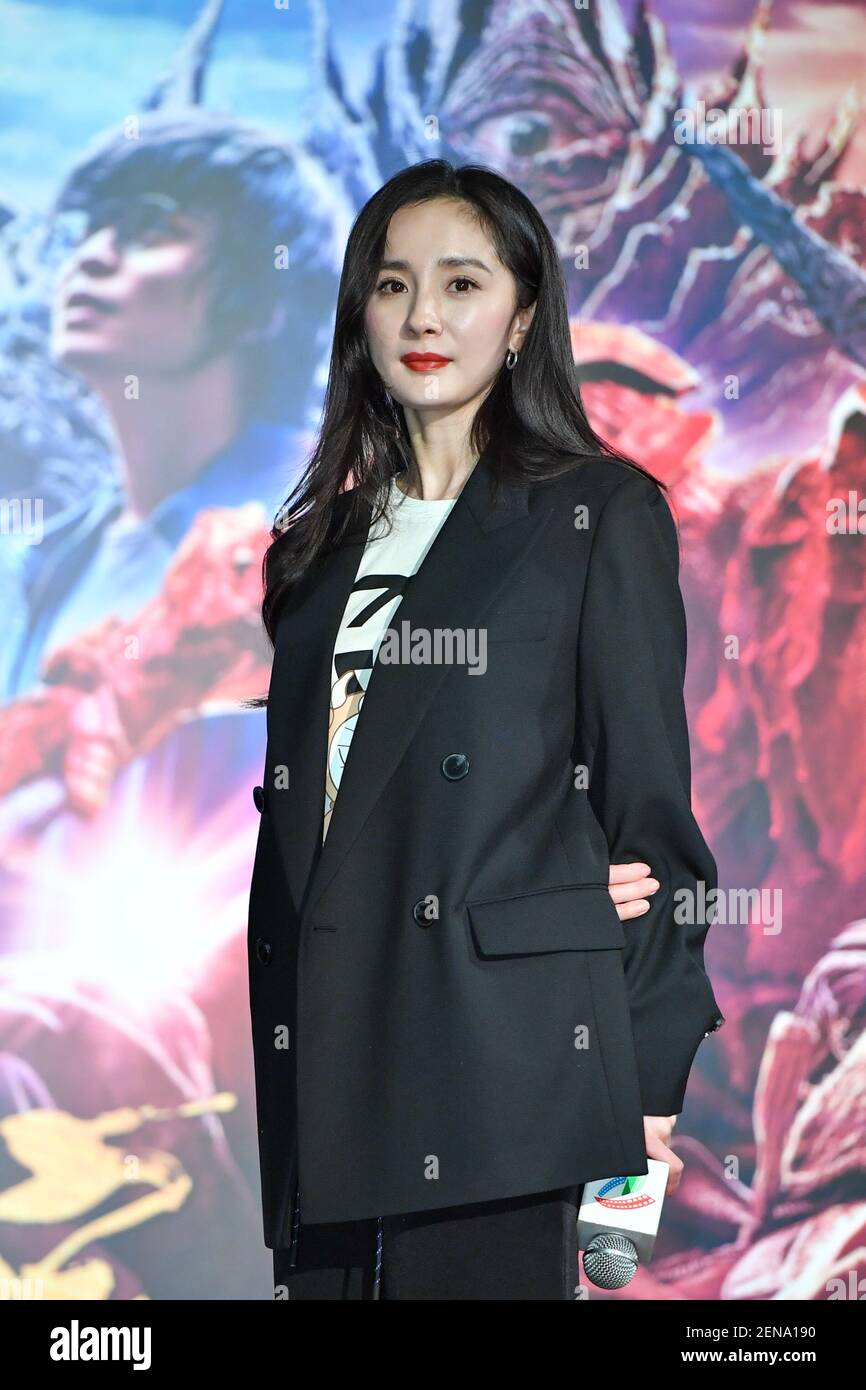 Chinese actress and singer Yang Mi, dressing in a black suit, attends a ...