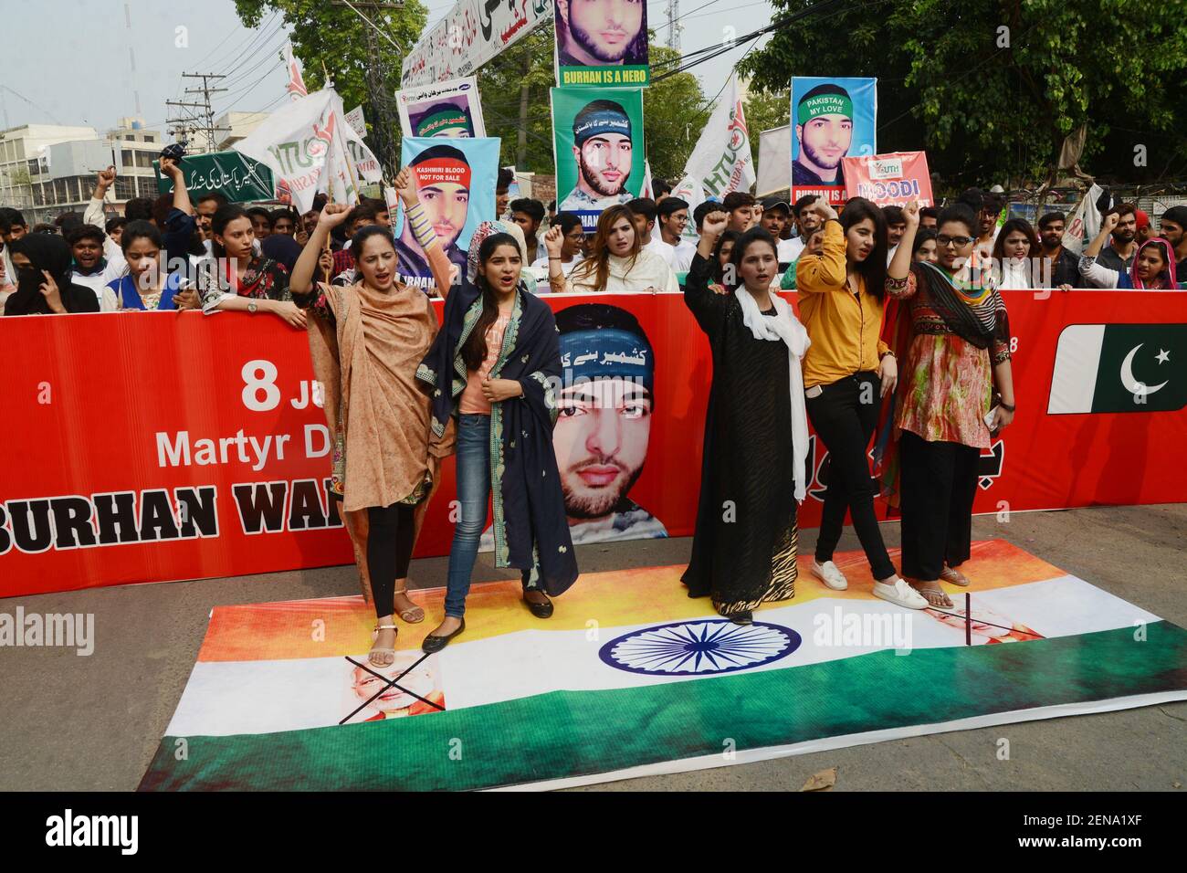 Pakistani activists of Youth Forum for Kashmir hold placards featuring ...