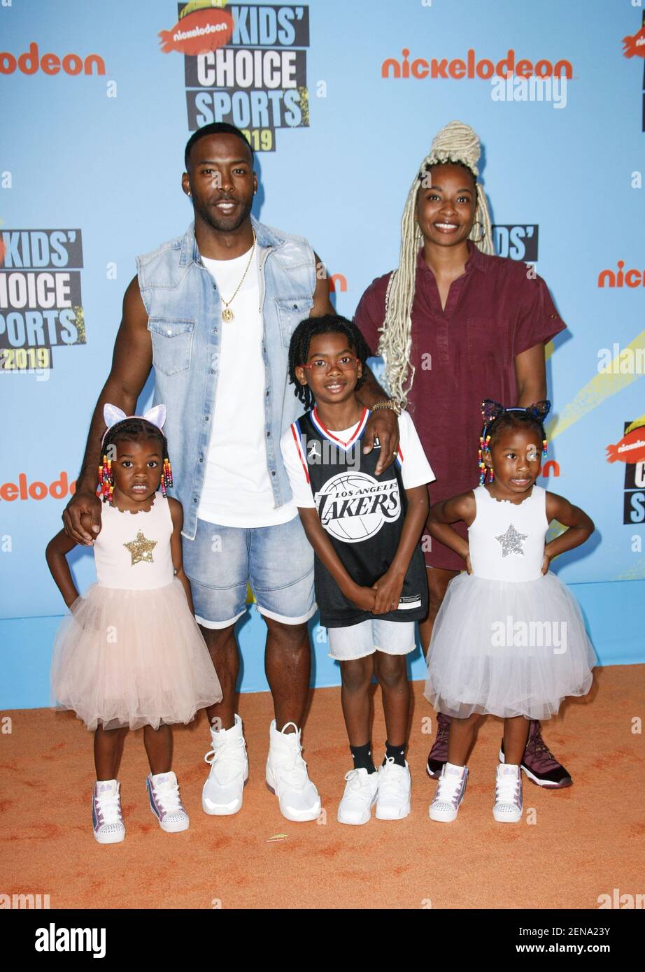 SANTA MONICA, CA - JULY 11: Andrew Hawkins (L), Kisha Hawkins and ...