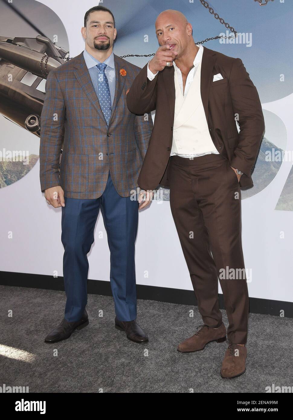 (L-R) Roman Reigns and Dwayne Johnson at the FAST & FURIOUS Presents ...