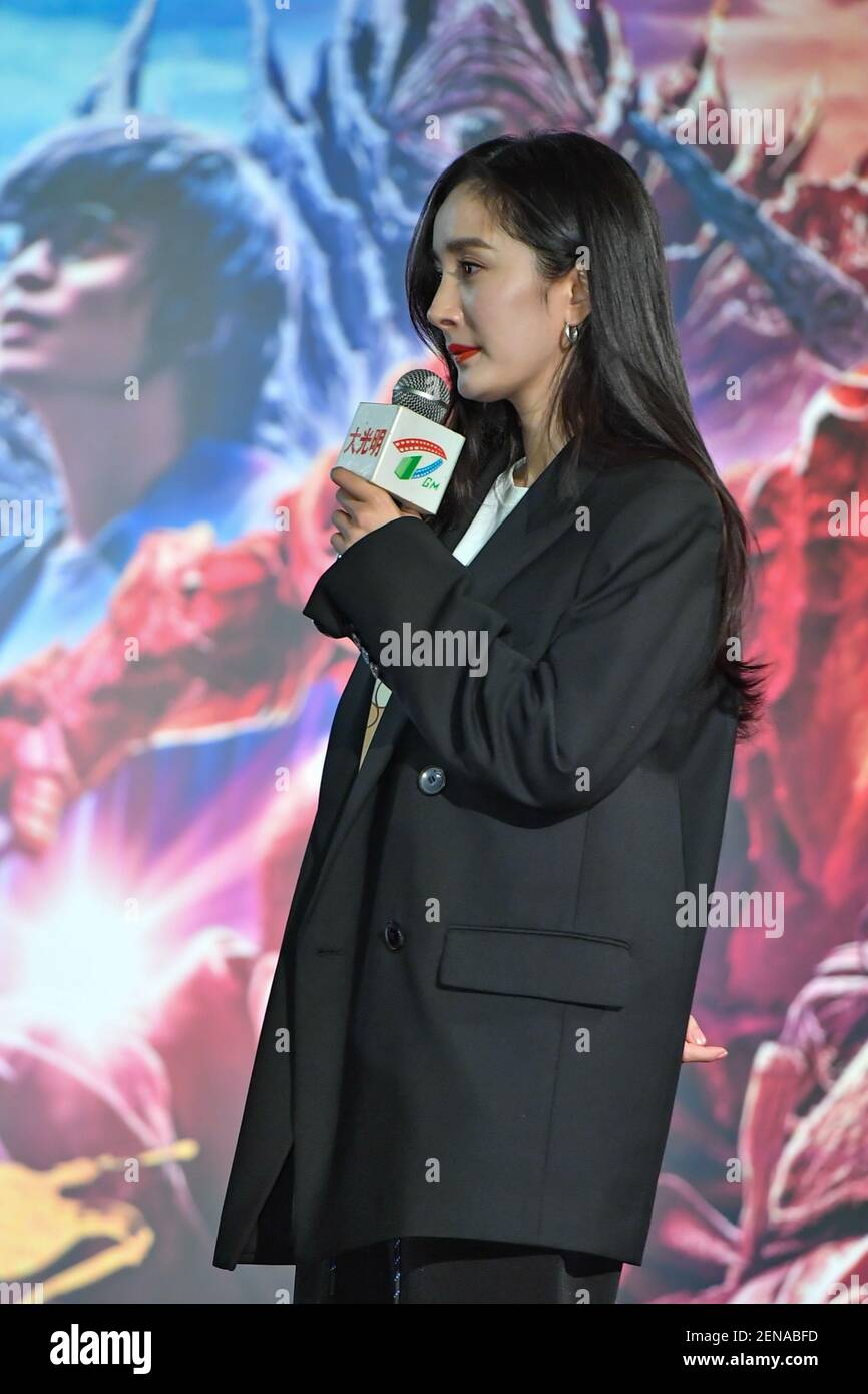 Chinese actress and singer Yang Mi, dressing in a black suit, attends a ...