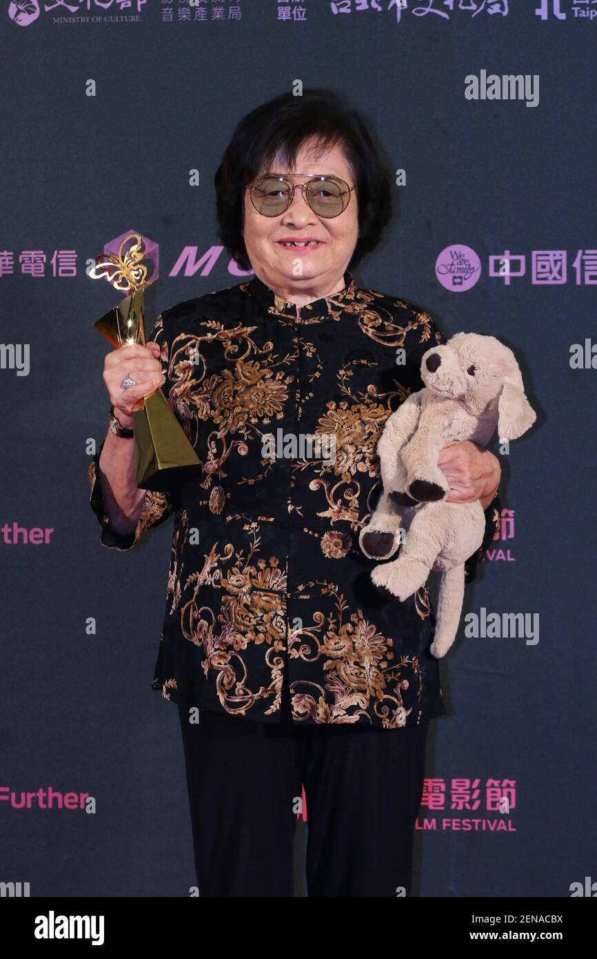 Taiwanese actress Yin-Shang poses with her trophy after winning Best ...