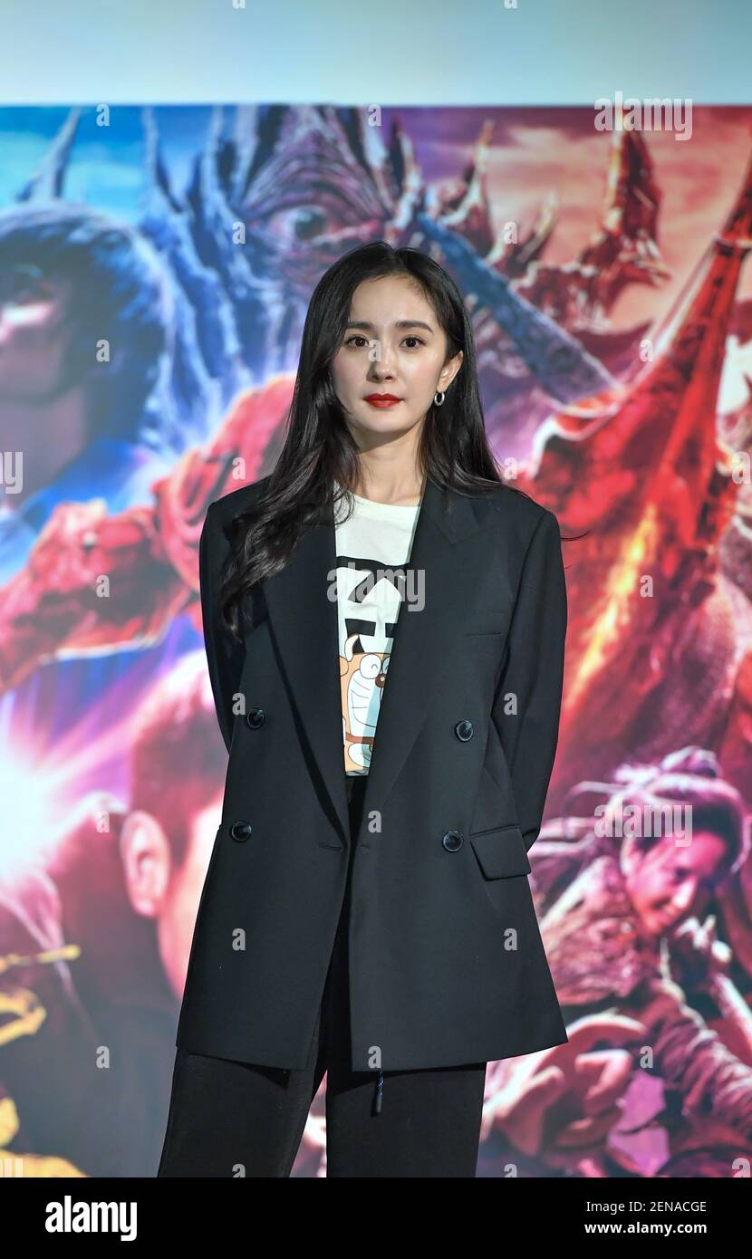 Chinese actress and singer Yang Mi, dressing in a black suit, attends a ...