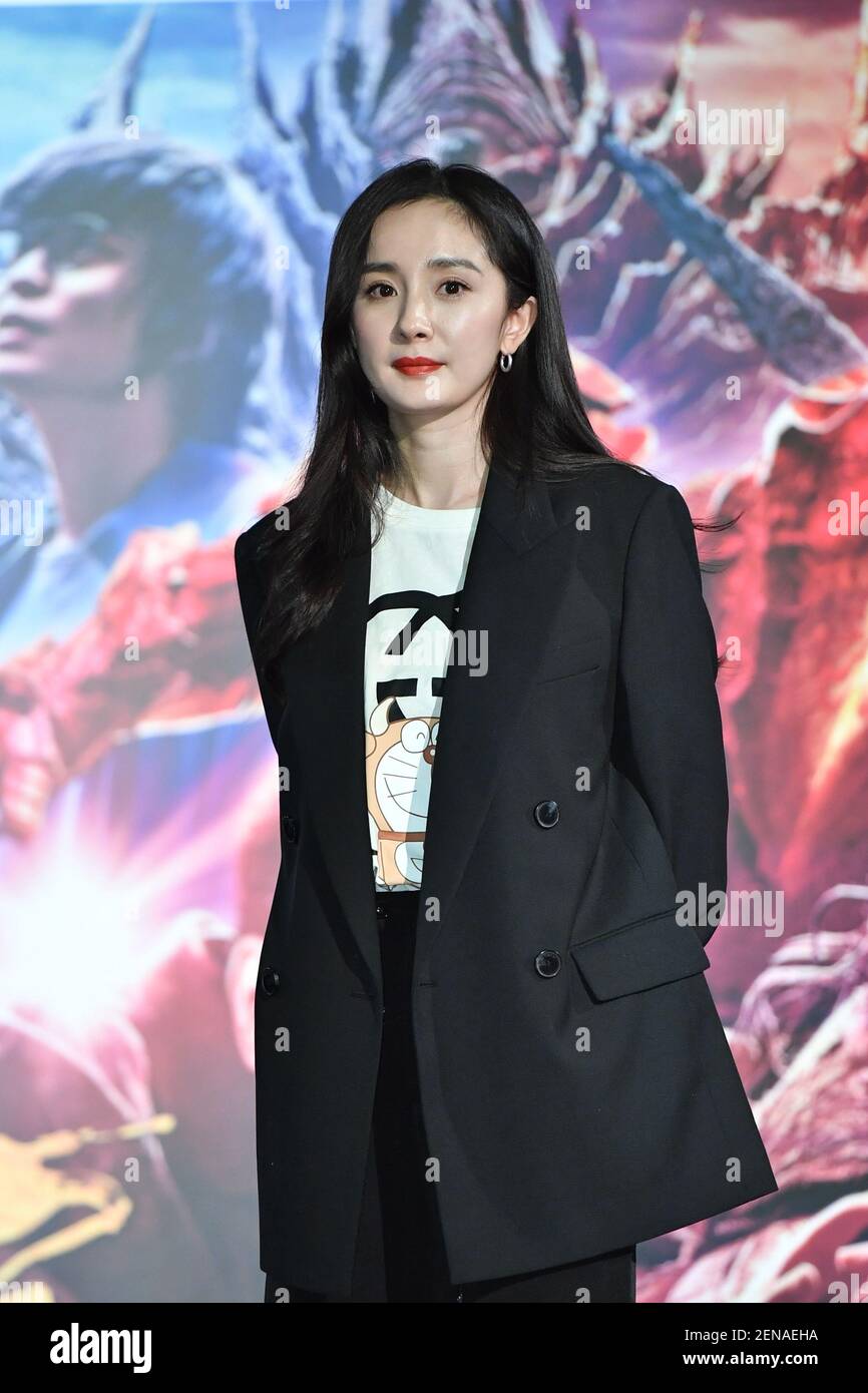 Chinese actress and singer Yang Mi, dressing in a black suit, attends a ...