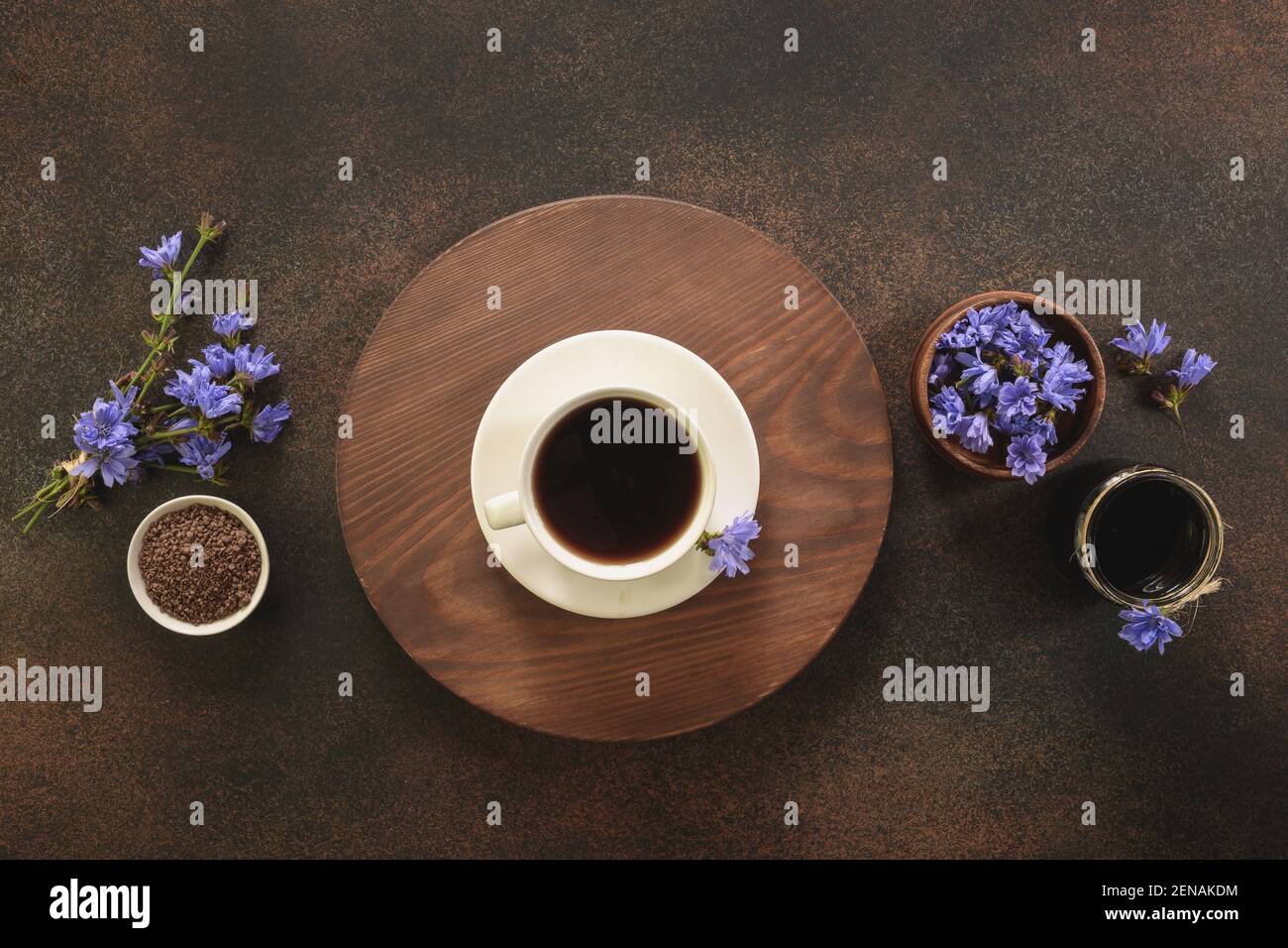 Healthy chicory beverage and blue flowers. Coffee substitute. Top view ...