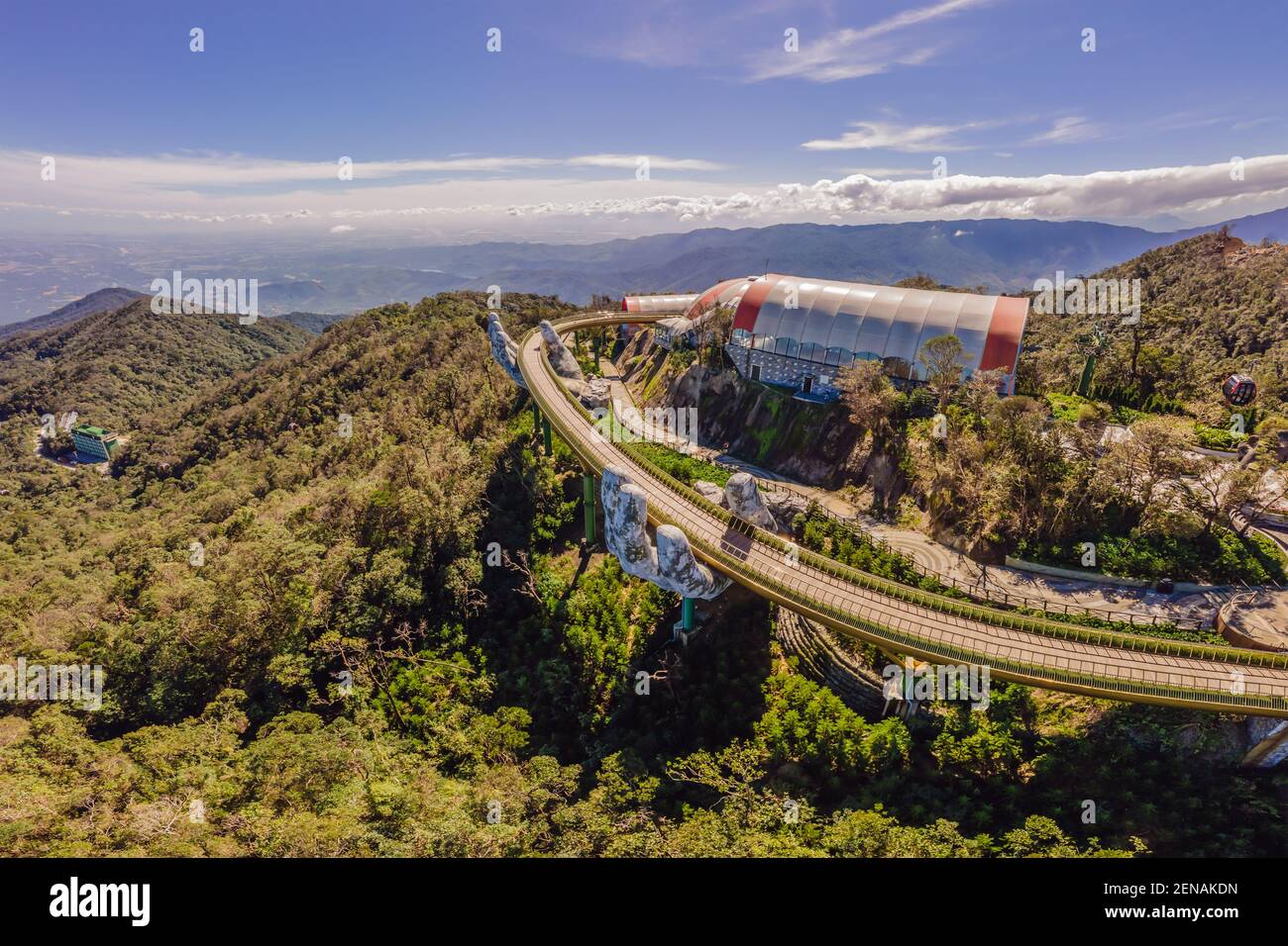 Top aerial view of the famous Golden Bridge is lifted by two giant ...