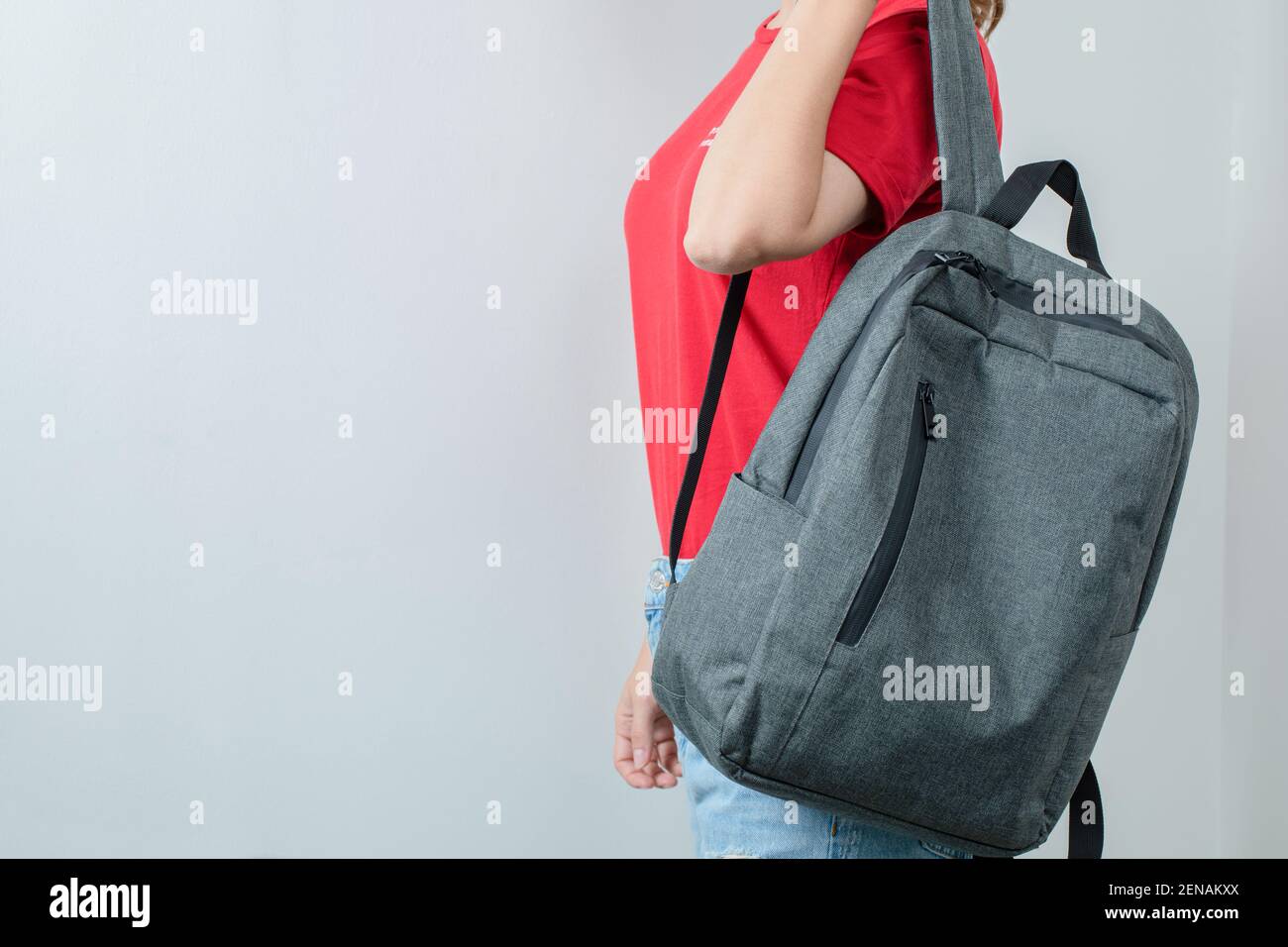 Grey backpack hi-res stock photography and images - Alamy
