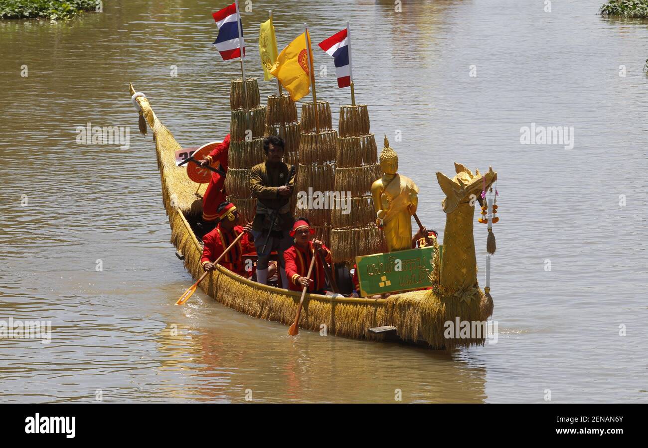 A boat carrying wax castle moves along a canal to take part in a colorful procession ahead of ...