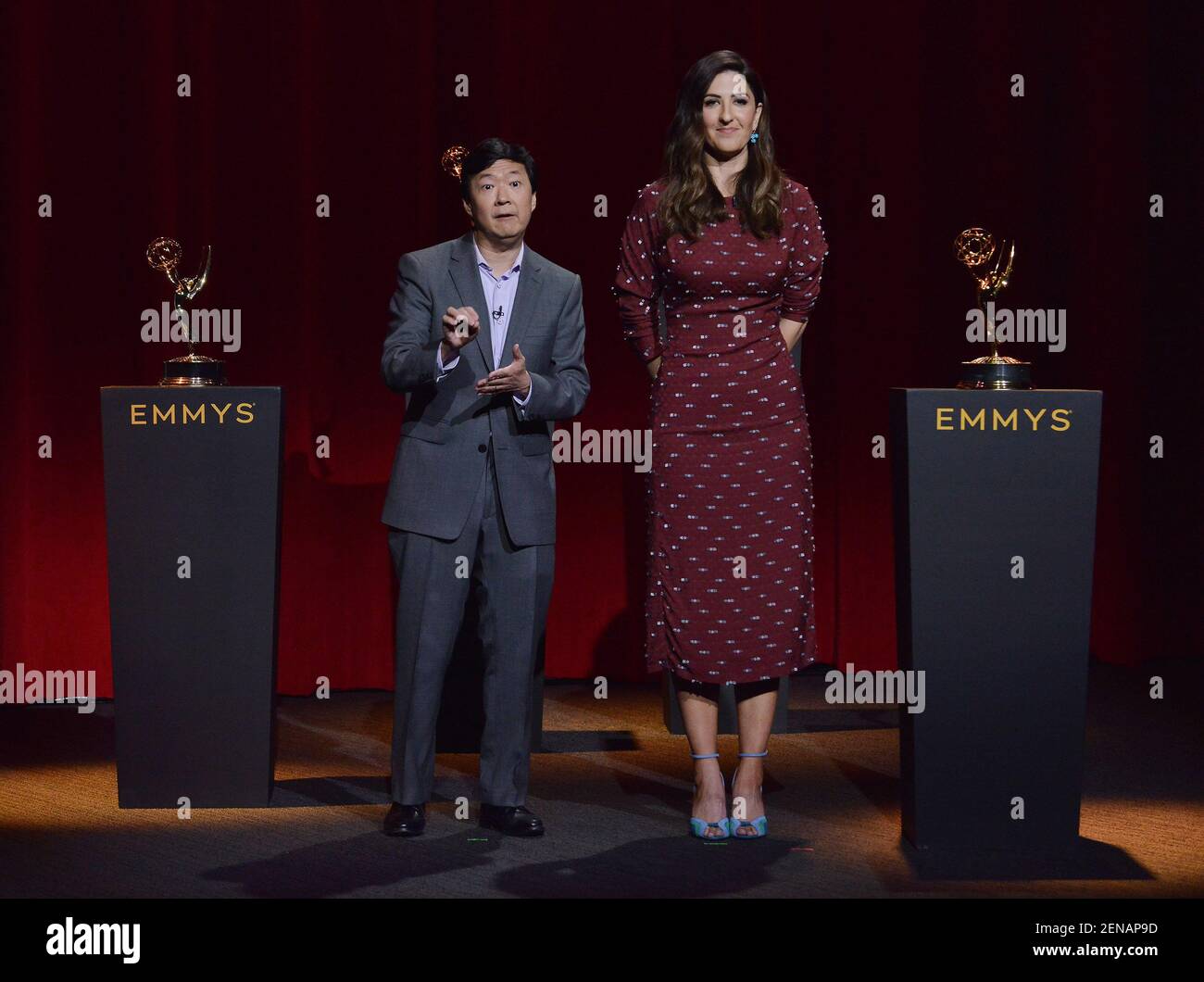 (L-R) Ken Jeong and D'Arcy Carden on stage at the 71st Emmy Awards ...