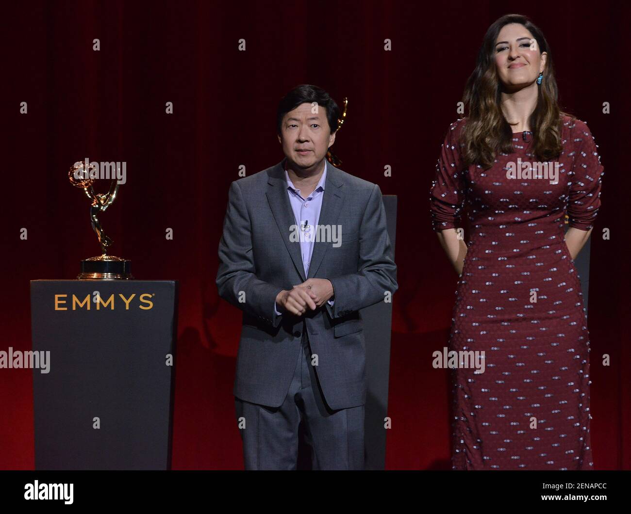 (L-R) Ken Jeong and D'Arcy Carden on stage at the 71st Emmy Awards ...