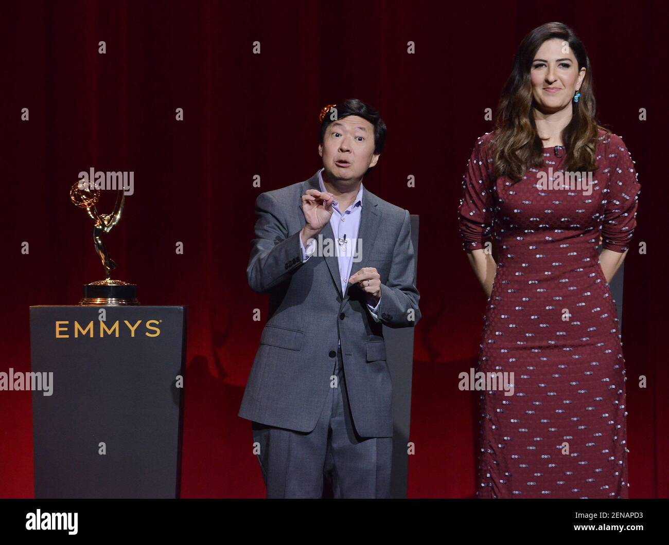 (L-R) Ken Jeong and D'Arcy Carden on stage at the 71st Emmy Awards ...