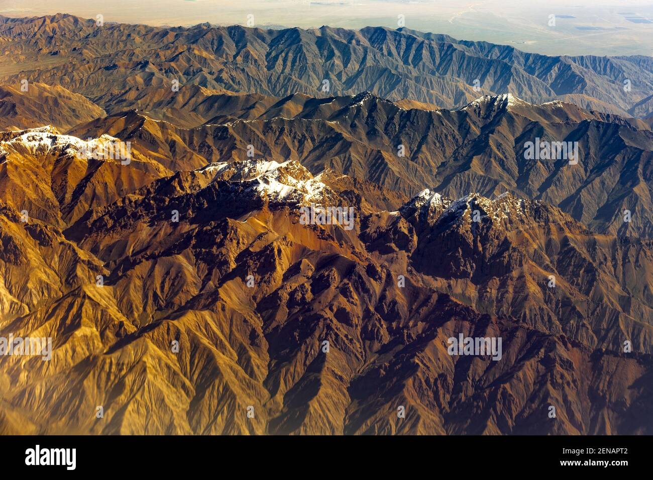 Aerial views of snow mountains in Xinjiang, the largest province in ...