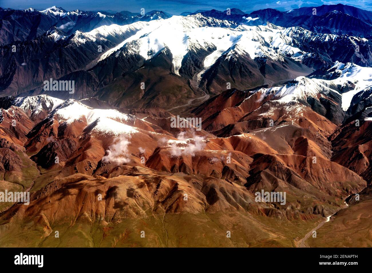 Aerial views of snow mountains in Xinjiang, the largest province in ...