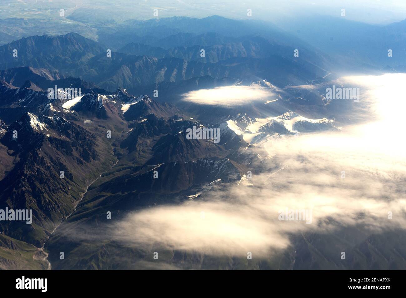 Aerial views of snow mountains in Xinjiang, the largest province in ...