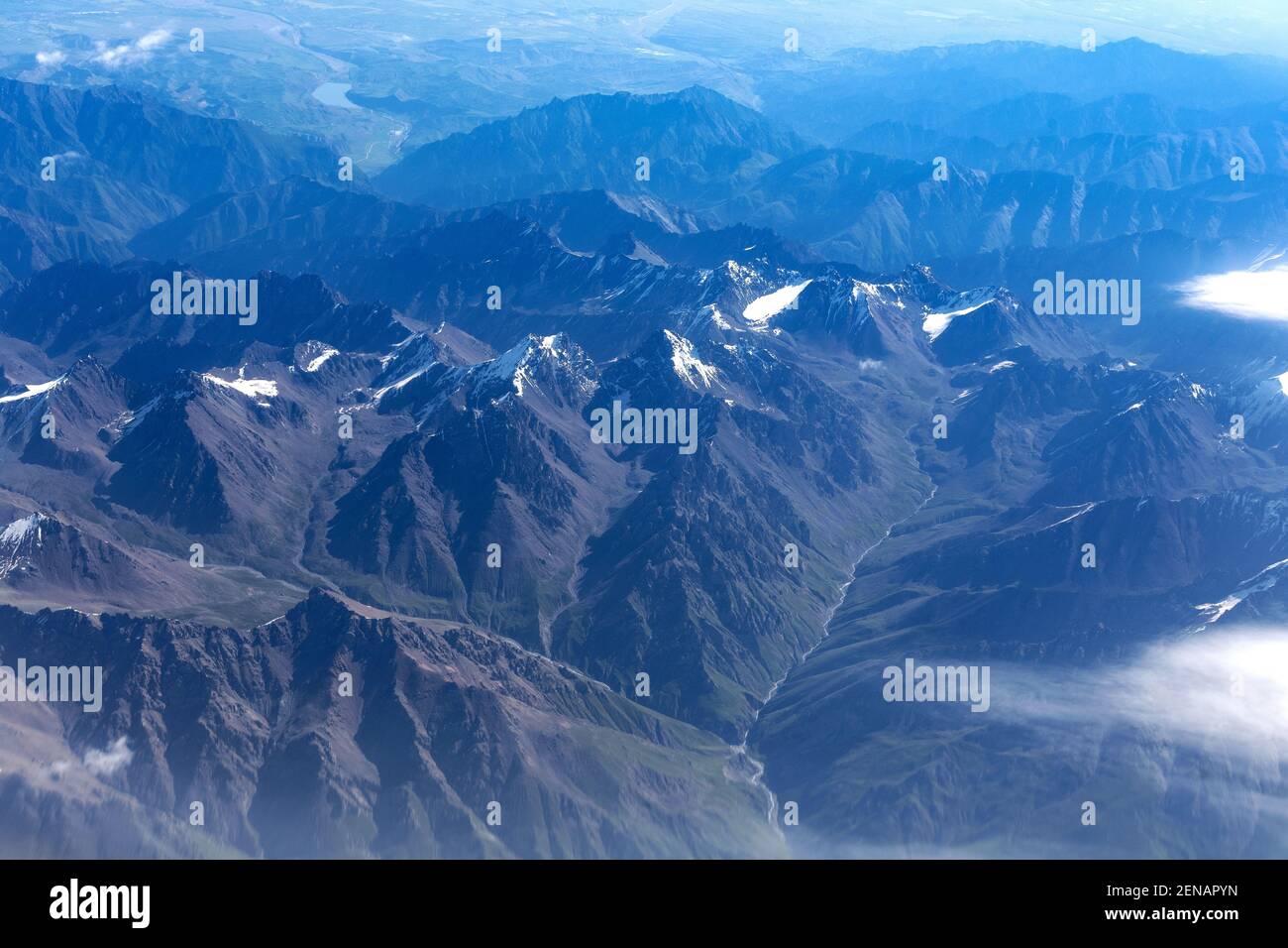 Aerial views of snow mountains in Xinjiang, the largest province in ...