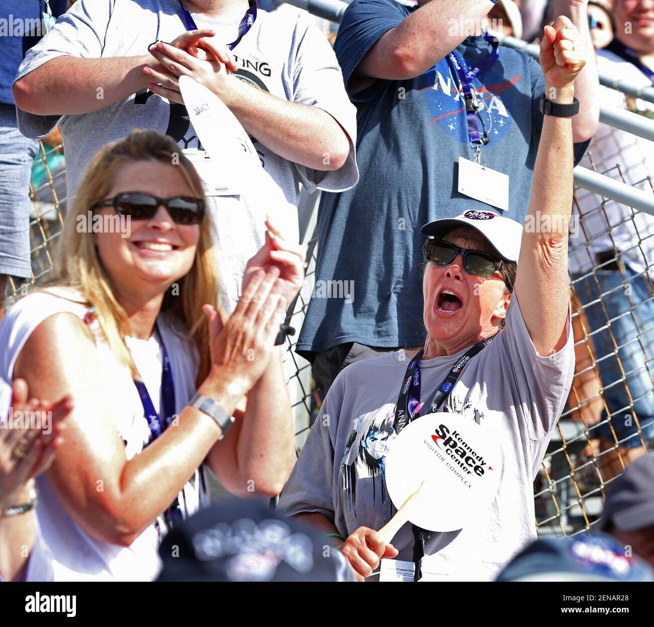 Space fans cheer at the moment of lift-off during the Apollo 11 Launch ...