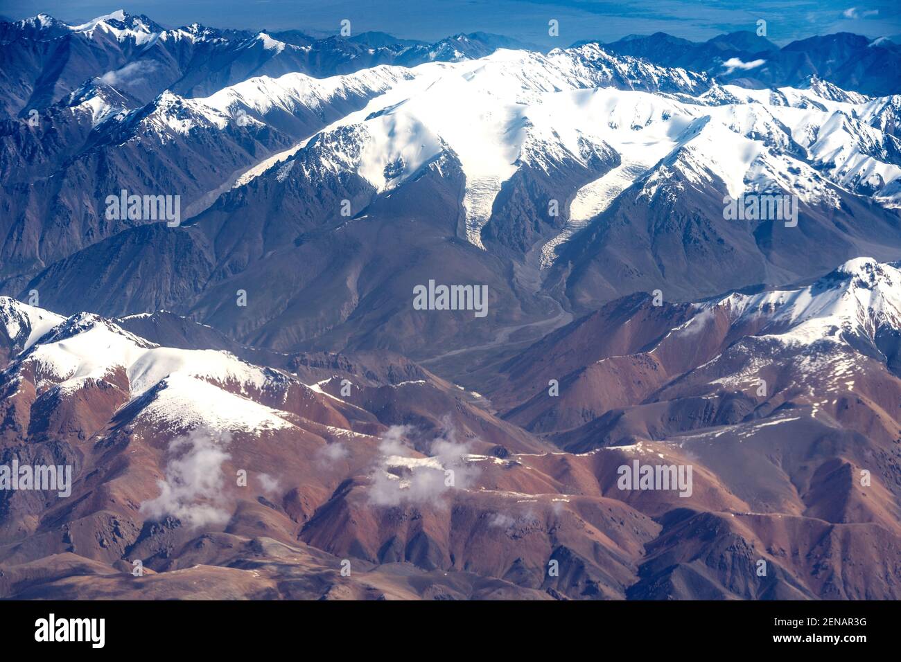 Aerial views of snow mountains in Xinjiang, the largest province in ...