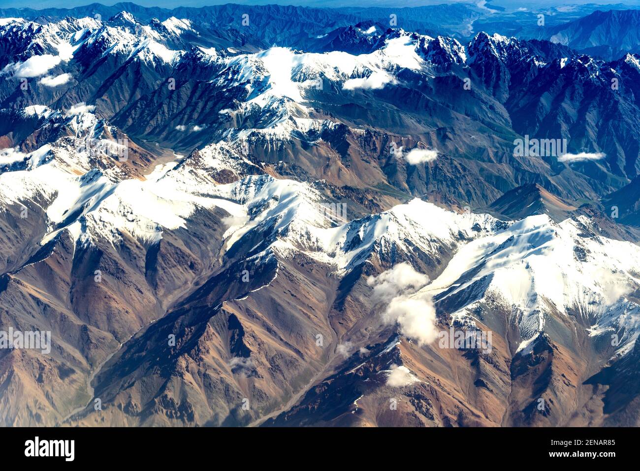 Aerial views of snow mountains in Xinjiang, the largest province in ...