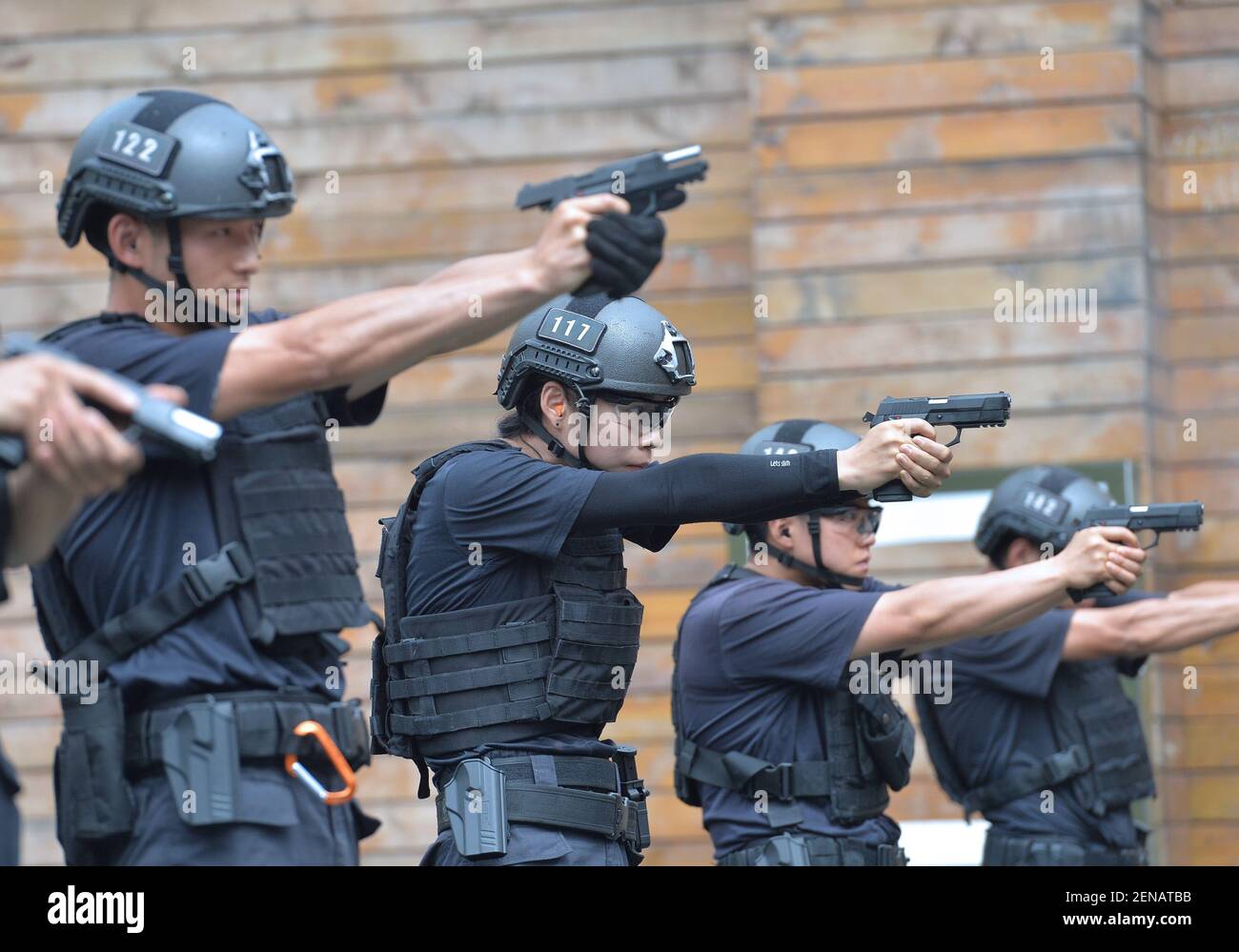 SWAT police officers competes in a pistol event during the 2019 World ...