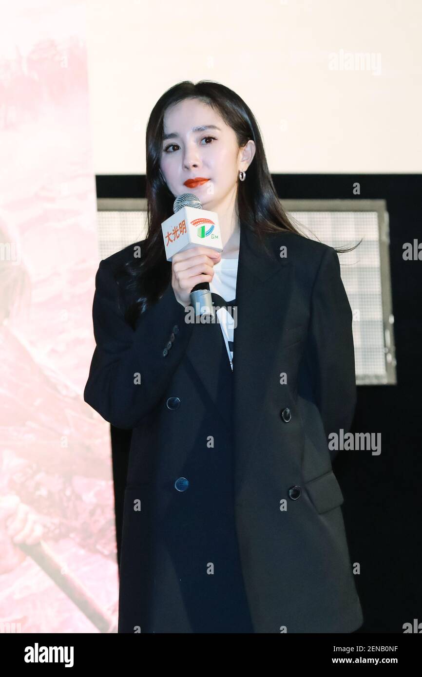 Chinese actress and singer Yang Mi, dressing in a black suit, attends a ...