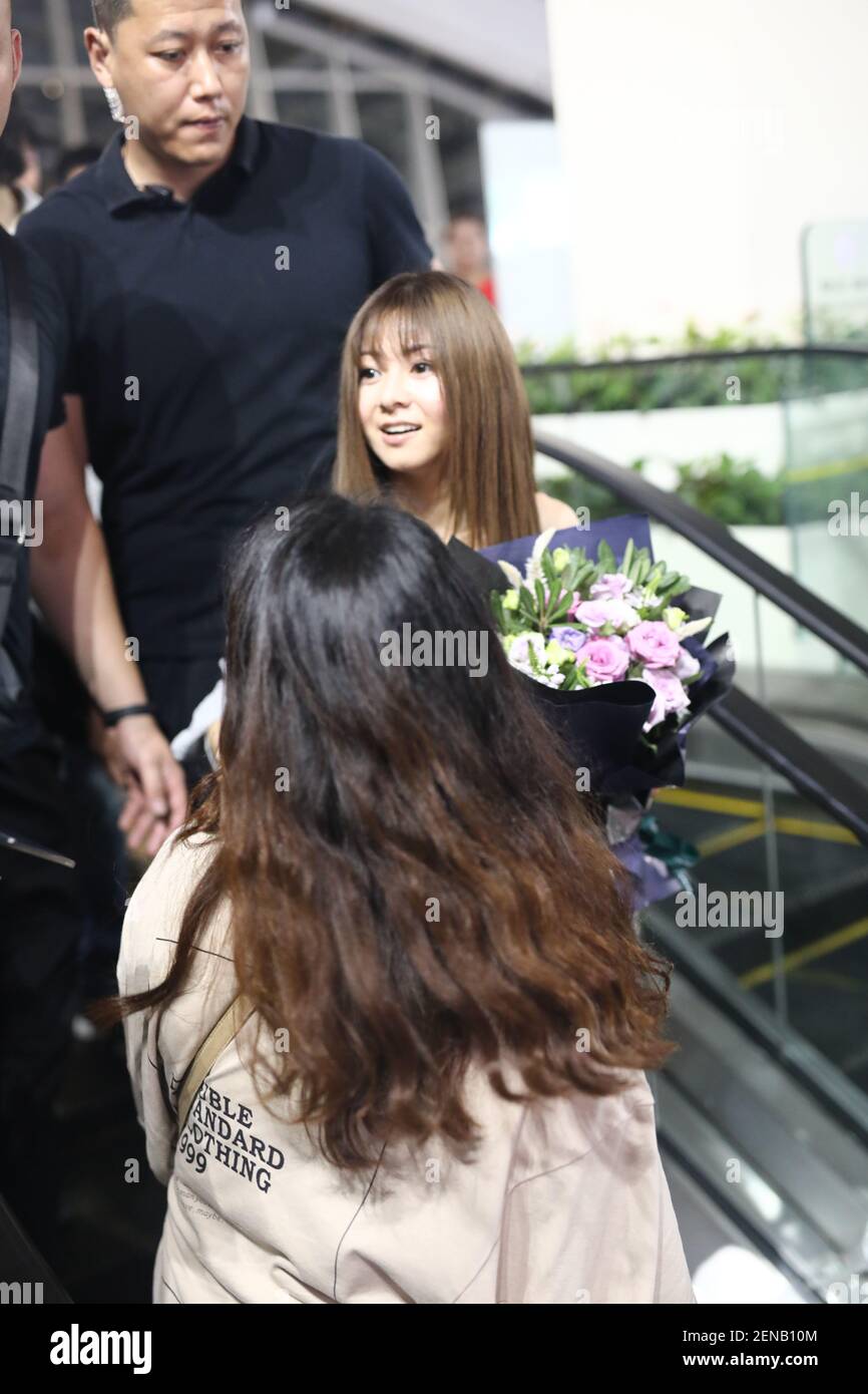Japanese singer Mai Kuraki arrives at the Beijing Capital International ...