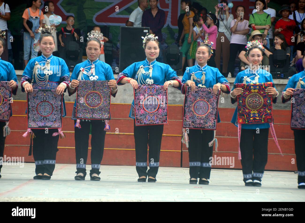 Chinese people of Dong ethnic group dressed in traditional costumes ...