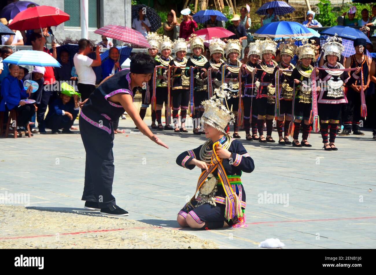 Chinese people of Dong ethnic group dressed in traditional costumes ...